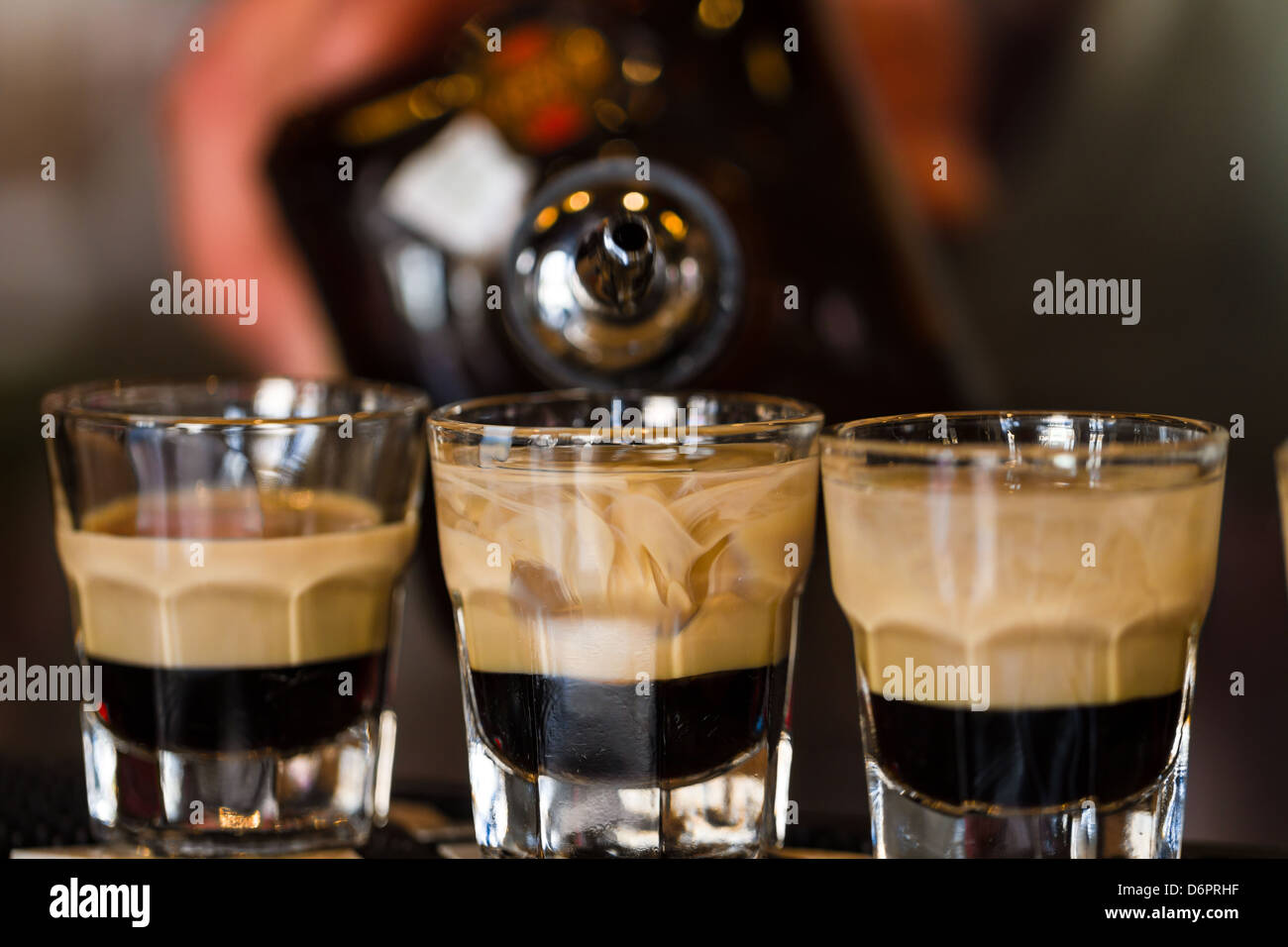 Barman make alcoholic shots in nightclub. Cocktail bar and cocktail ...