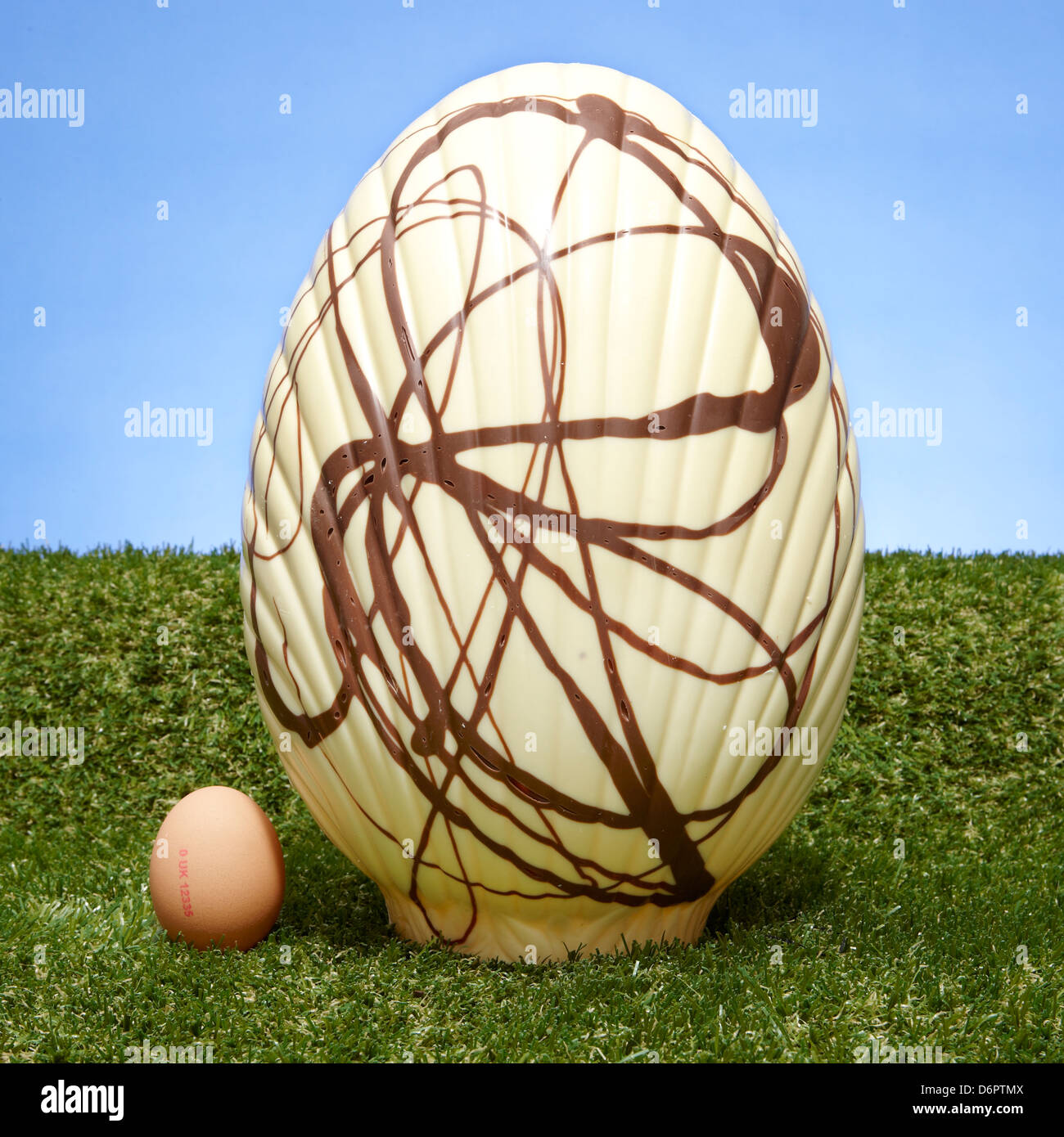 Huge white chocolate egg hi-res stock photography and images - Alamy