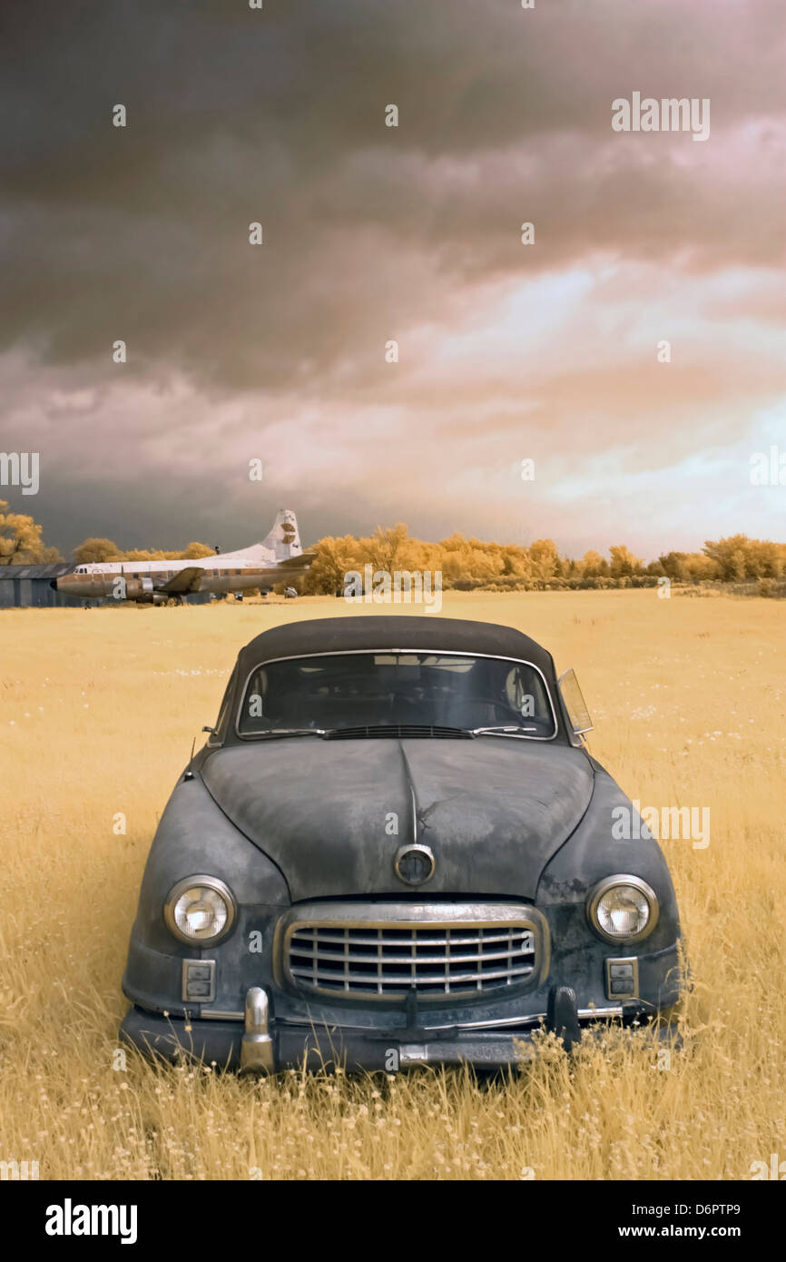 Old car rusting away in a field Stock Photo - Alamy