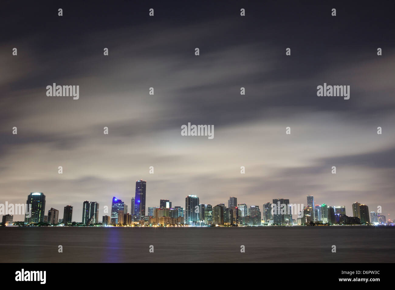 Skyscrapers lit up at the waterfront, Downtown Miami, Miami, Miami-Dade ...