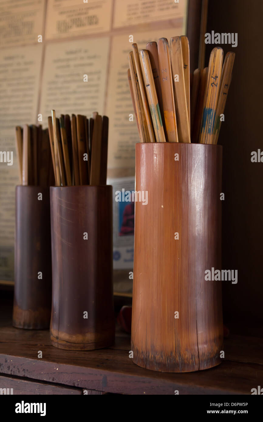 Three fortune sticks in temple Stock Photo - Alamy