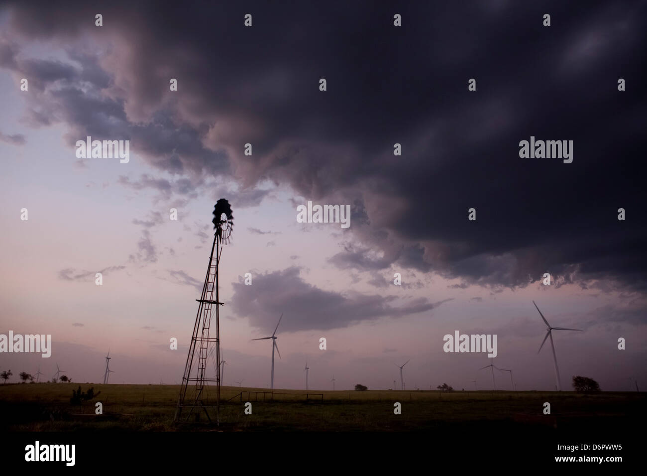 Wind turbines under storm clouds hi-res stock photography and images ...
