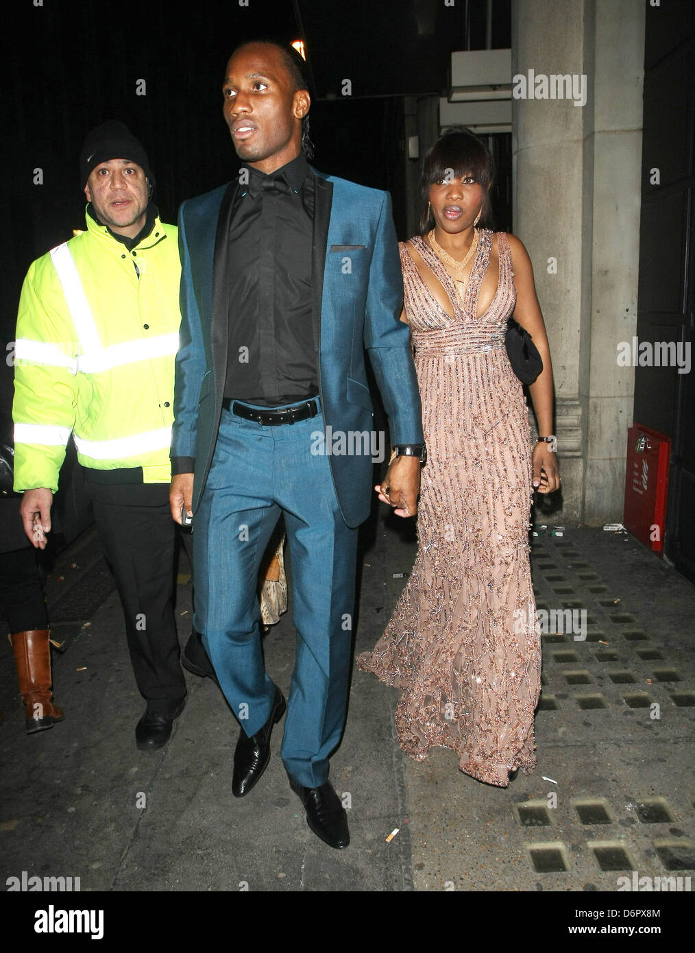 Didier Drogba and his wife Alla arrive at China White club after ...