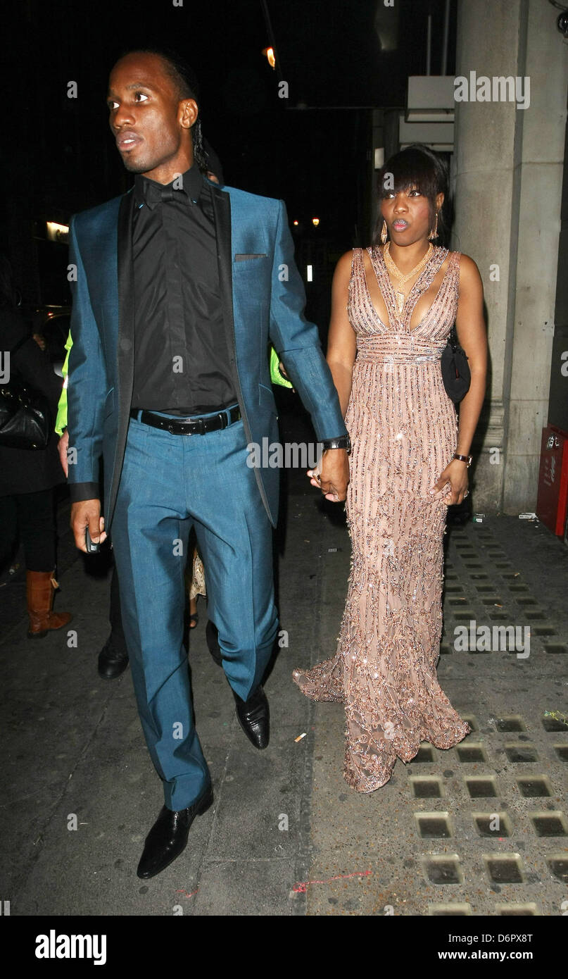 Didier Drogba and his wife Alla arrive at China White club after ...