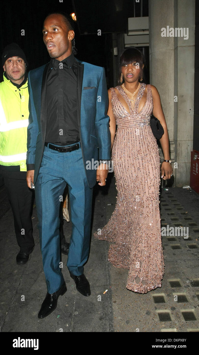 Didier Drogba and his wife Alla arrive at China White club after ...