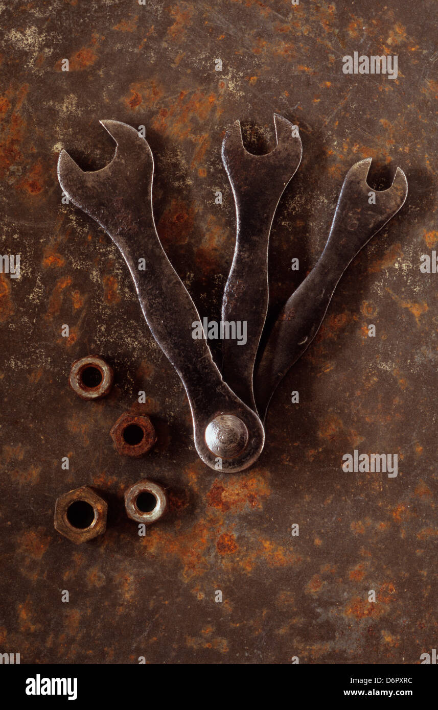 Set of wrenches and rusty nuts Stock Photo - Alamy