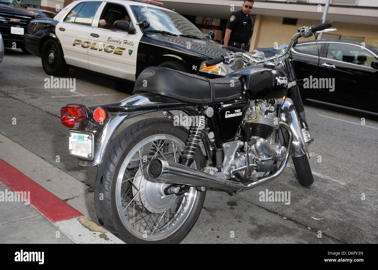 Keanu Reeves' 1973 Norton Commando 750 motorcycyle A woman parking on ...