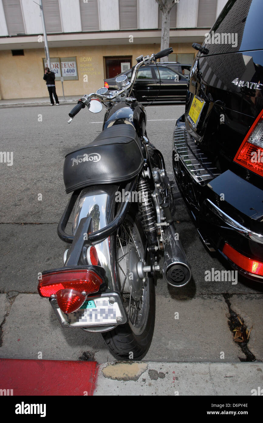 Keanu Reeves' 1973 Norton Commando 750 motorcycyle A woman parking on ...