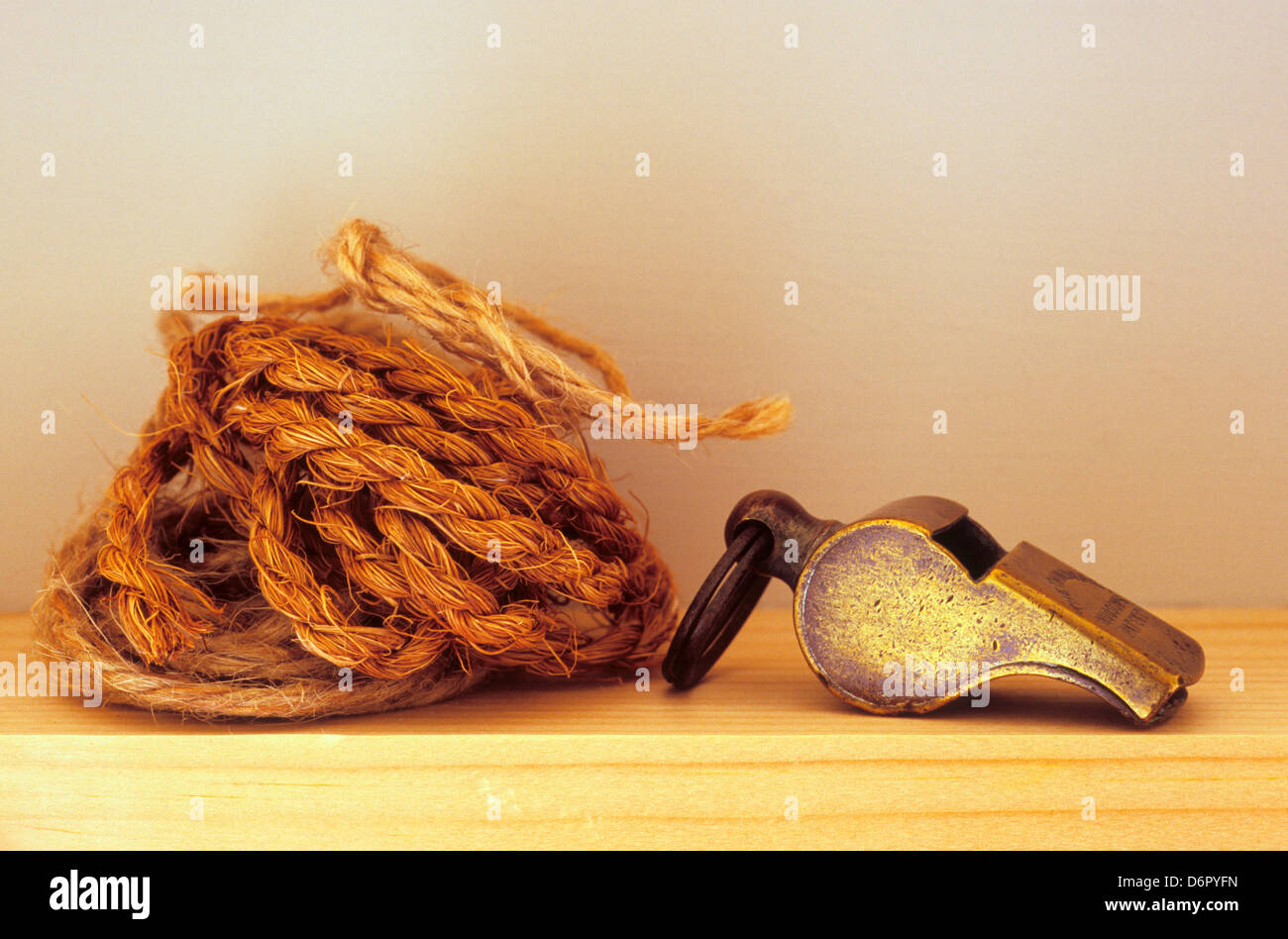 Still life with string and whistle Stock Photo - Alamy