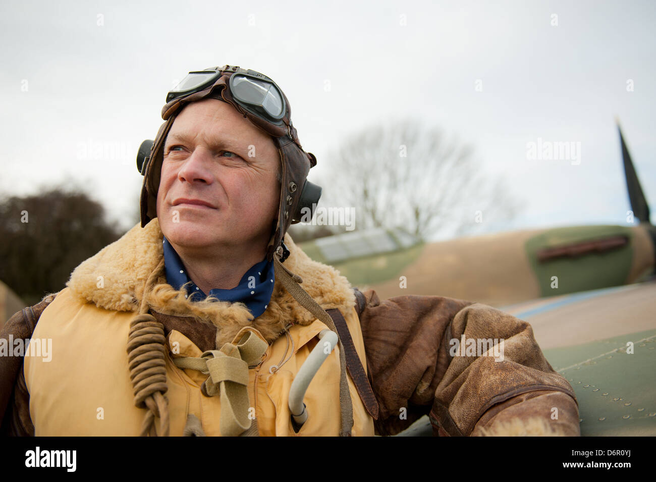 Portrait of WW2 Royal Air Force fighter pilot with his Hurricane ...