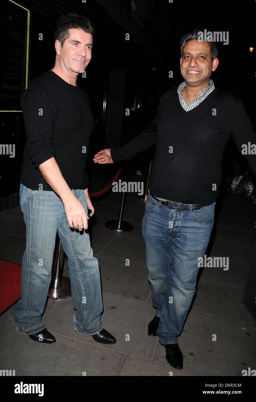 Simon Cowell and journalist Rav Singh leave Stringfellows club London ...