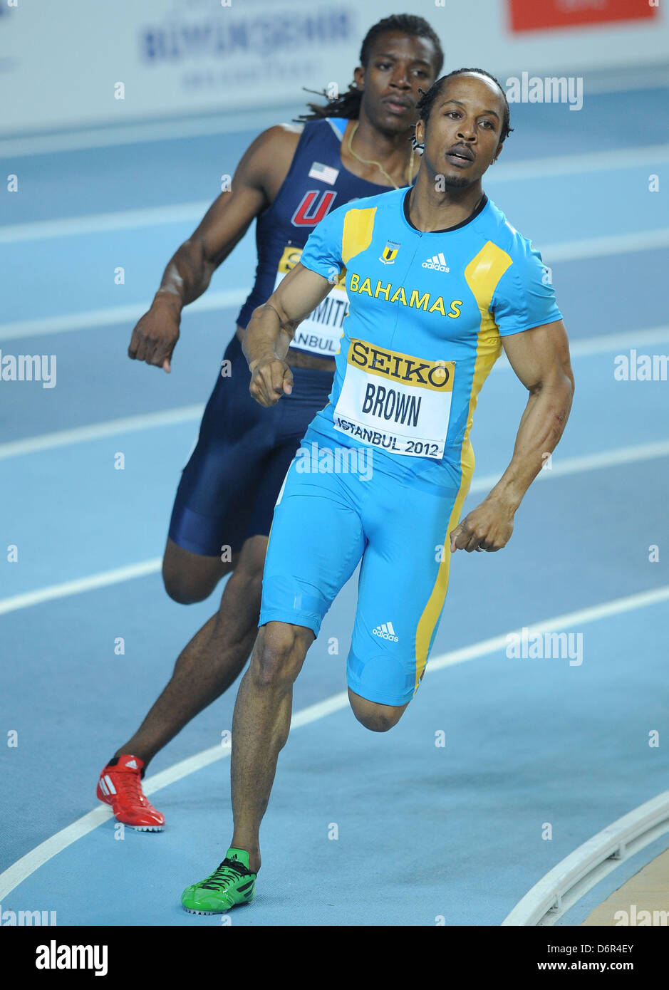 Calvin Smith of the US (Left) and Chris Brown of Bahama compete in heat ...