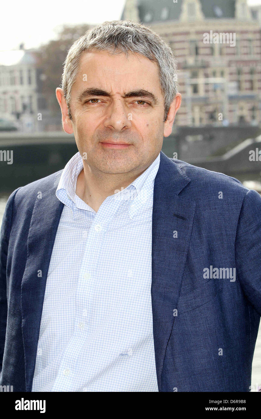 Rowan Atkinson poses for photographers during his promotional tour for ...