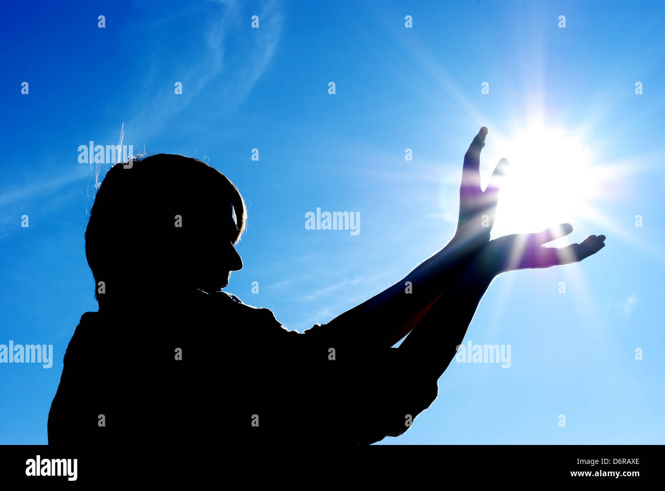 Man control the sun. Conceptual design Stock Photo - Alamy