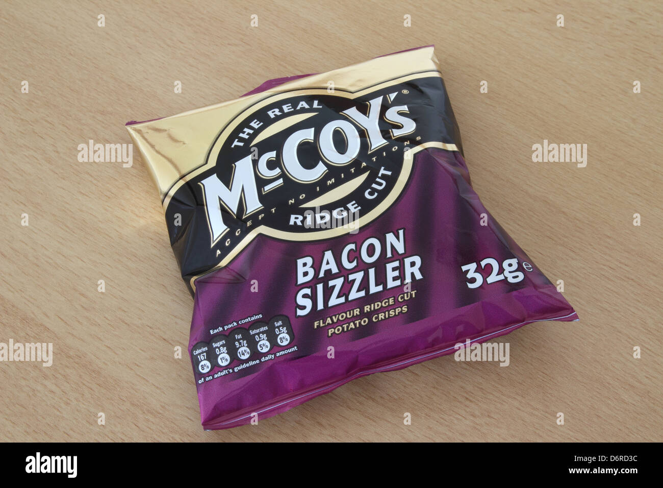 Packet of McCoy's Bacon Flavour Ridge Cut Crisps Stock Photo - Alamy