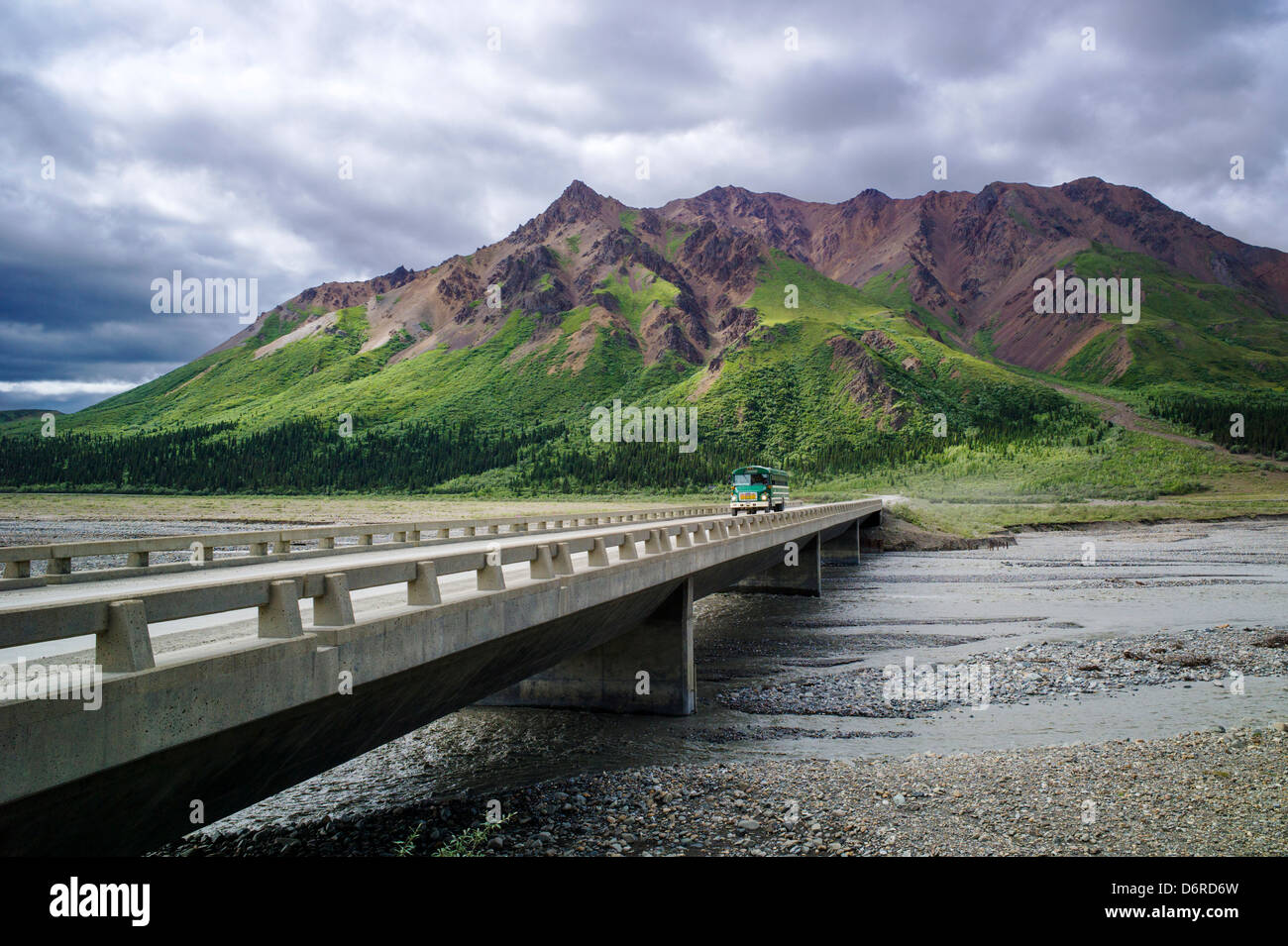Buses shuttle visitors across bridge over the Toklat River, Denali Park ...