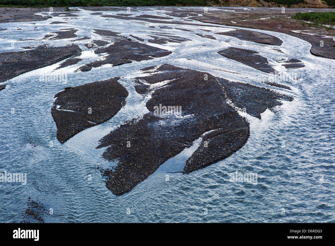Dusk skies reflect in the braided East Fork of the Toklat River, Denali ...