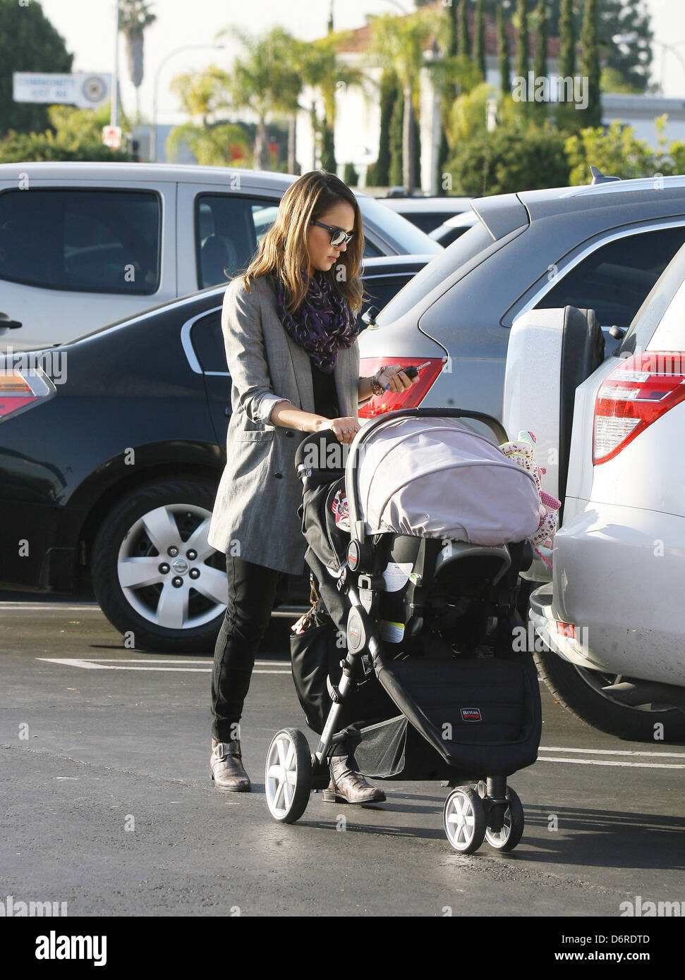 Jessica Alba arriving at Toys R US pushing her new baby daughter in a ...