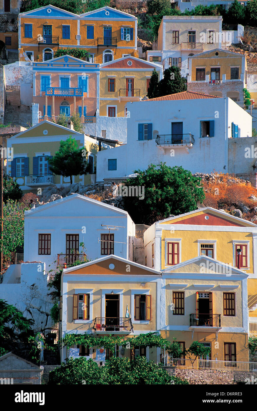 Greece, Dodecanese, Simi, Colorful houses on hill Stock Photo - Alamy