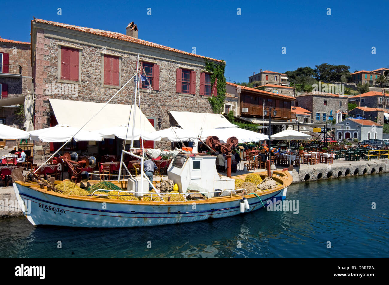 Greece, Lesvos Molivos village, Boat in harbour Stock Photo - Alamy