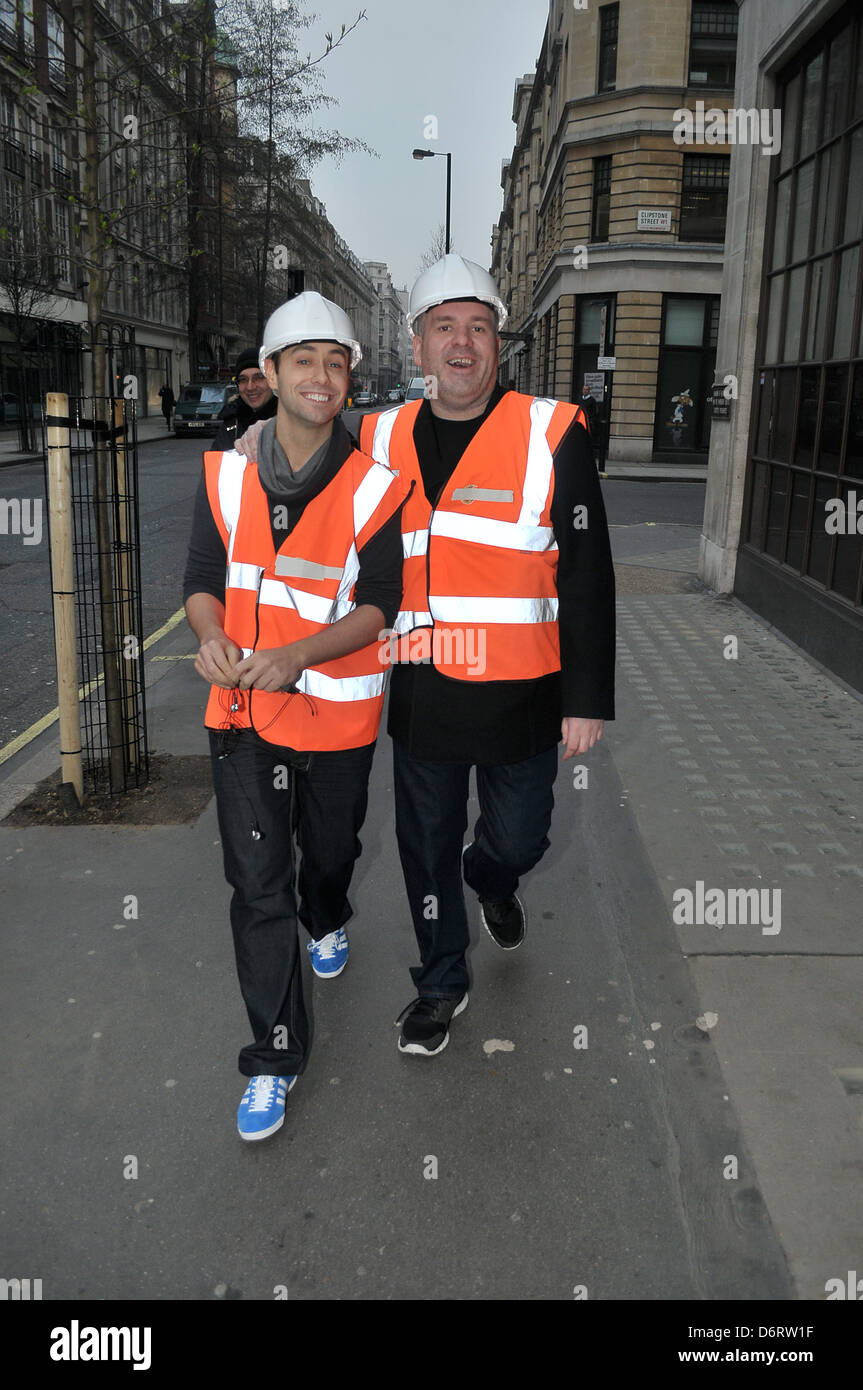 Chris Moyles leaving the BBC Radio 1 studios wearing a hard hat and a ...