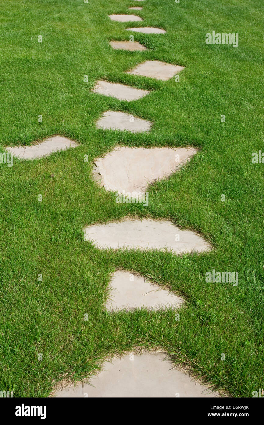 The Stone block walk path in the backyard Stock Photo - Alamy