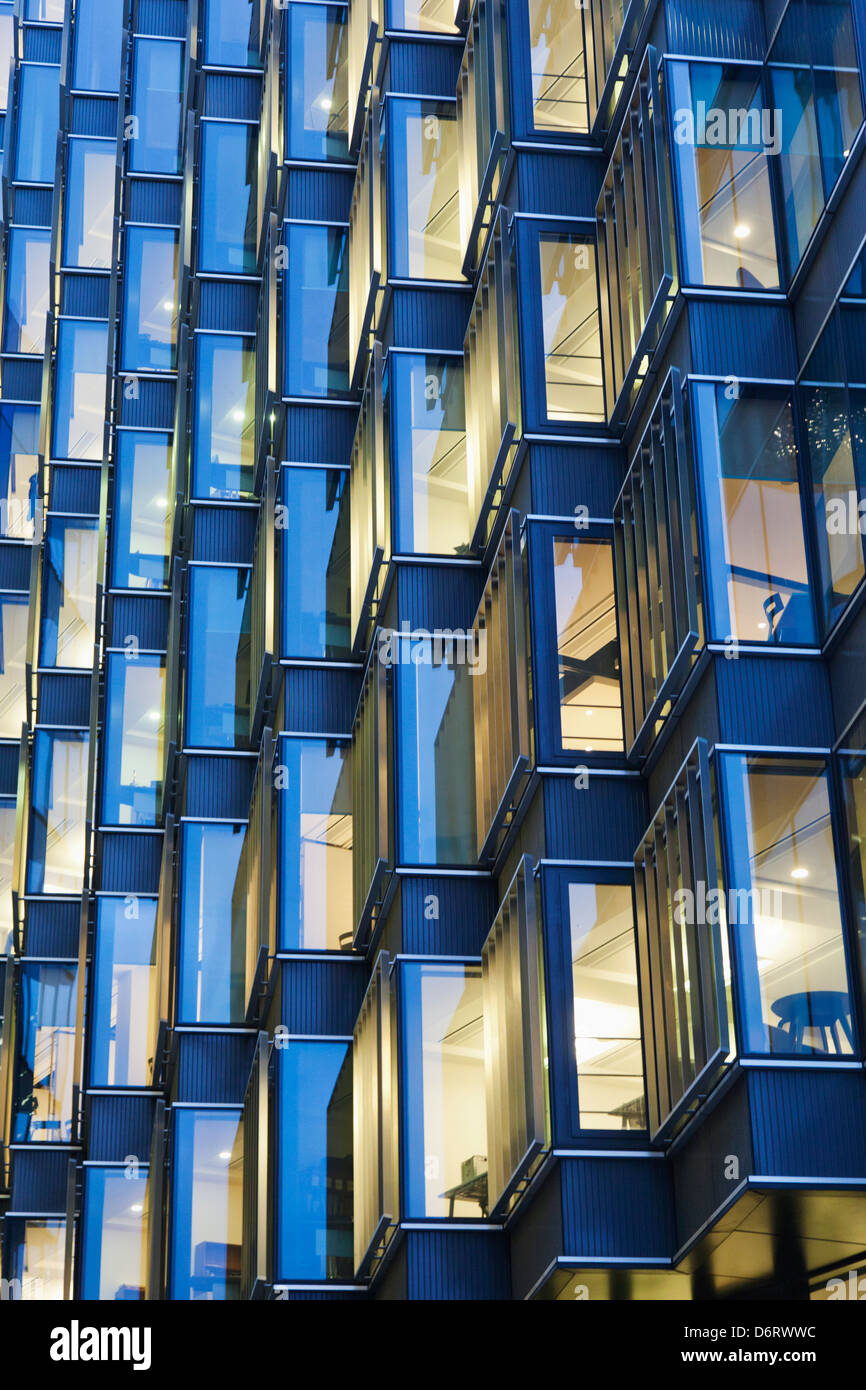 Office building full windows lit hi-res stock photography and images ...