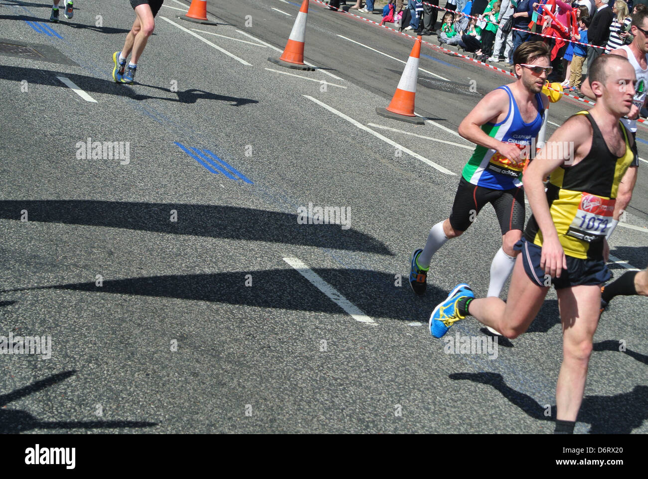 London Marathon runners, blue marks Stock Photo - Alamy