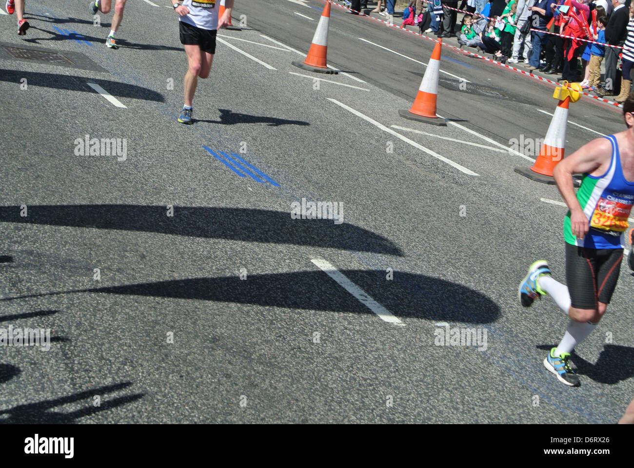 London Marathon, Runners, 13 miles, half way point, blue road markings ...
