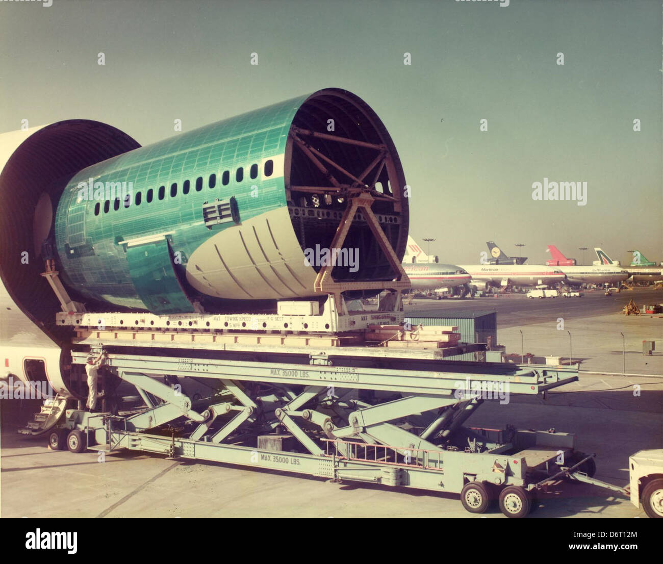 This image shows the assembly of the DC-10 fuselage at the Convair ...