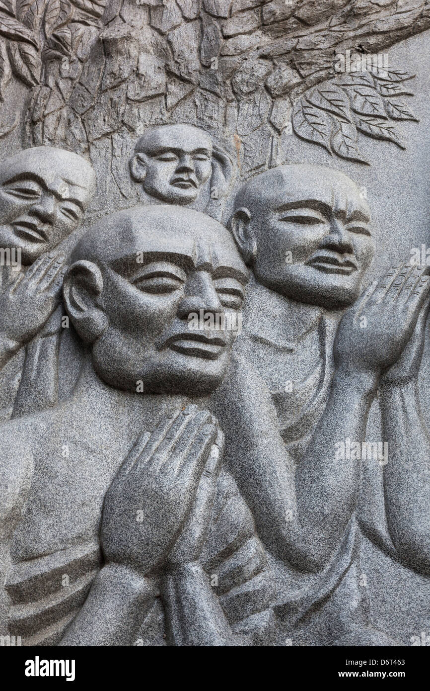 Vietnam, Nha Trang, Long Son Pagoda, Bas-relief depicting praying monks ...
