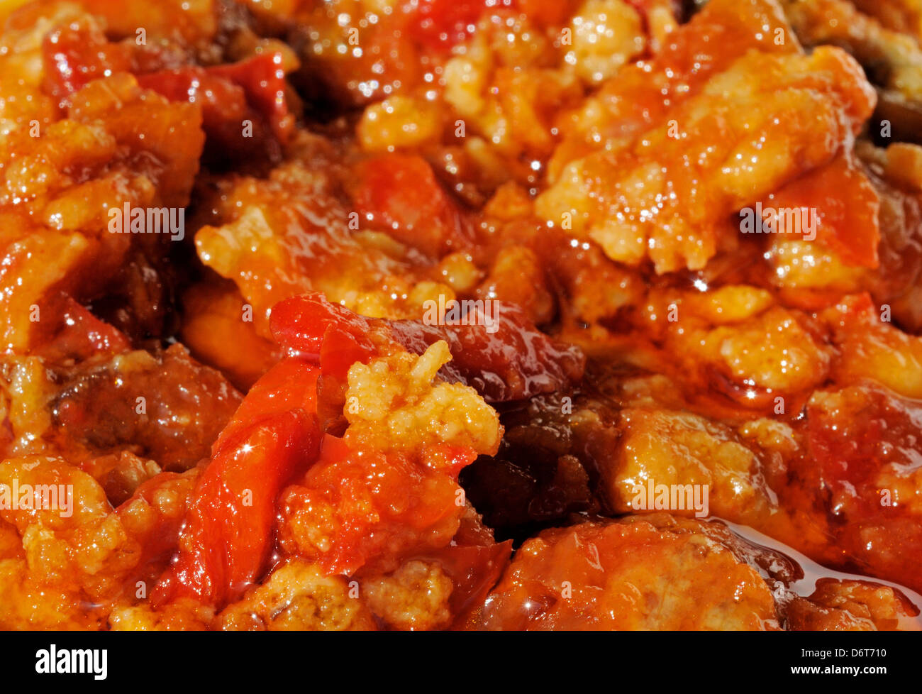 Tapas dish of pieces of cod in red pepper and tomato sauce, Andalusia ...
