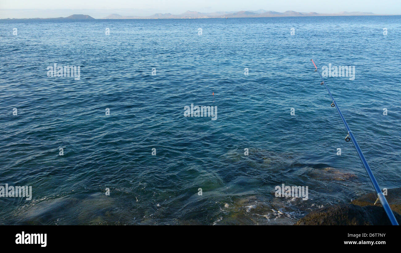 Fishing rocks hi-res stock photography and images - Alamy