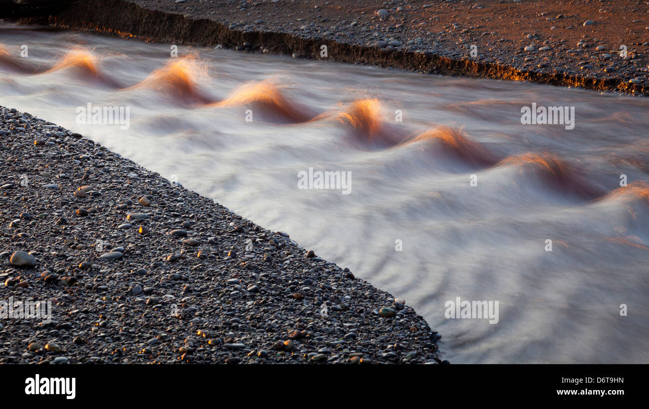 USA, Washington State, Waves in Stream at Sunset, Rialto Beach, Olympic ...