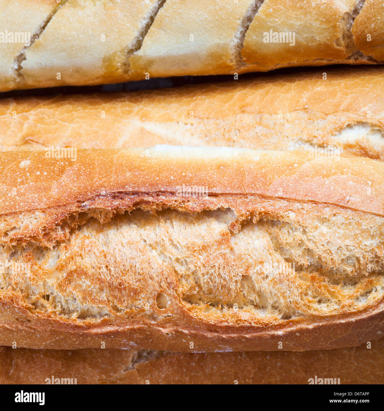 background from fresh baked loaves of bread close up Stock Photo - Alamy