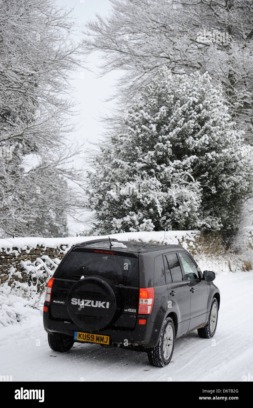 Four wheel drive car on a country lane Gloucestershire UK Stock Photo ...