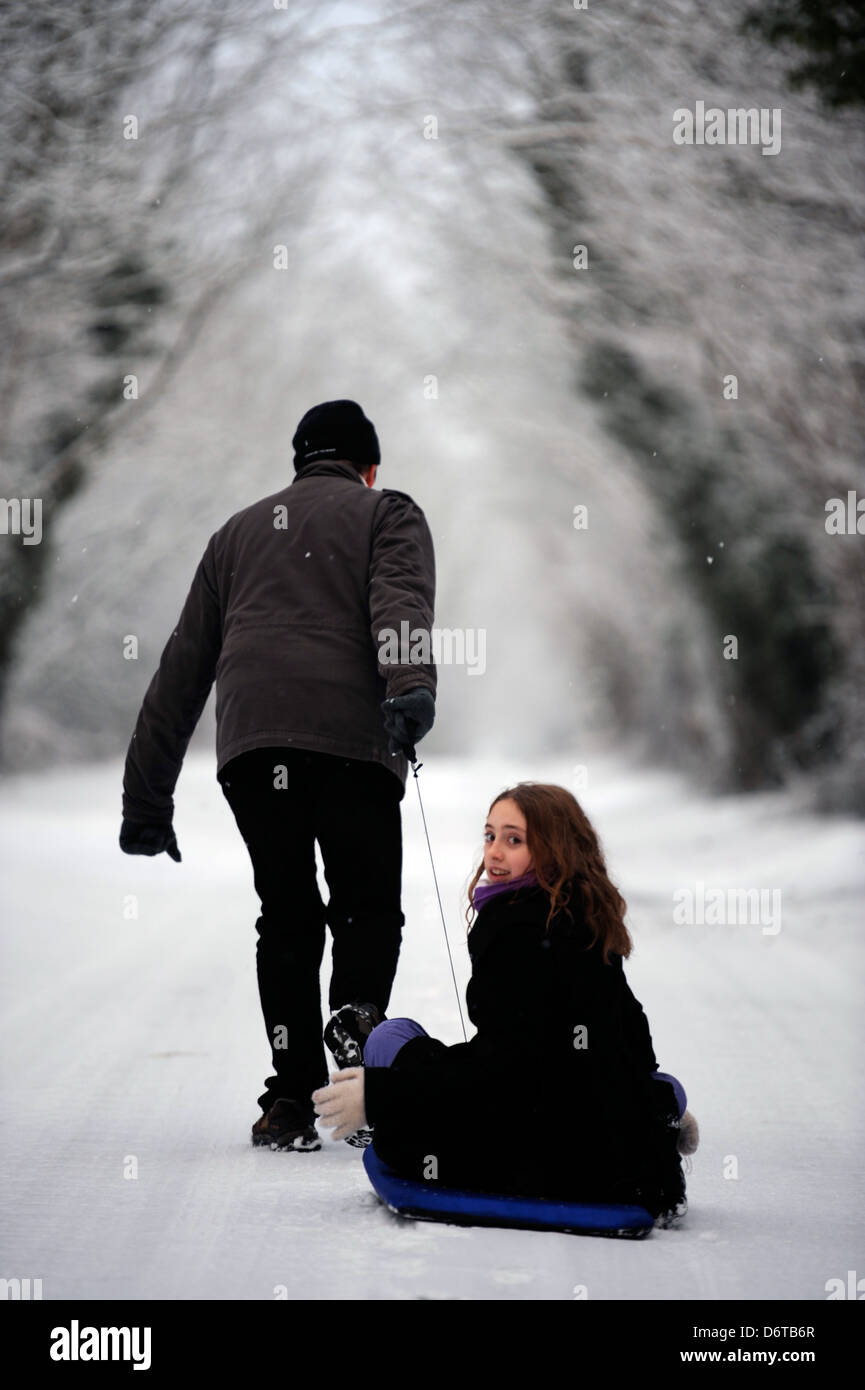 Pulling sledge snow school hi-res stock photography and images - Alamy