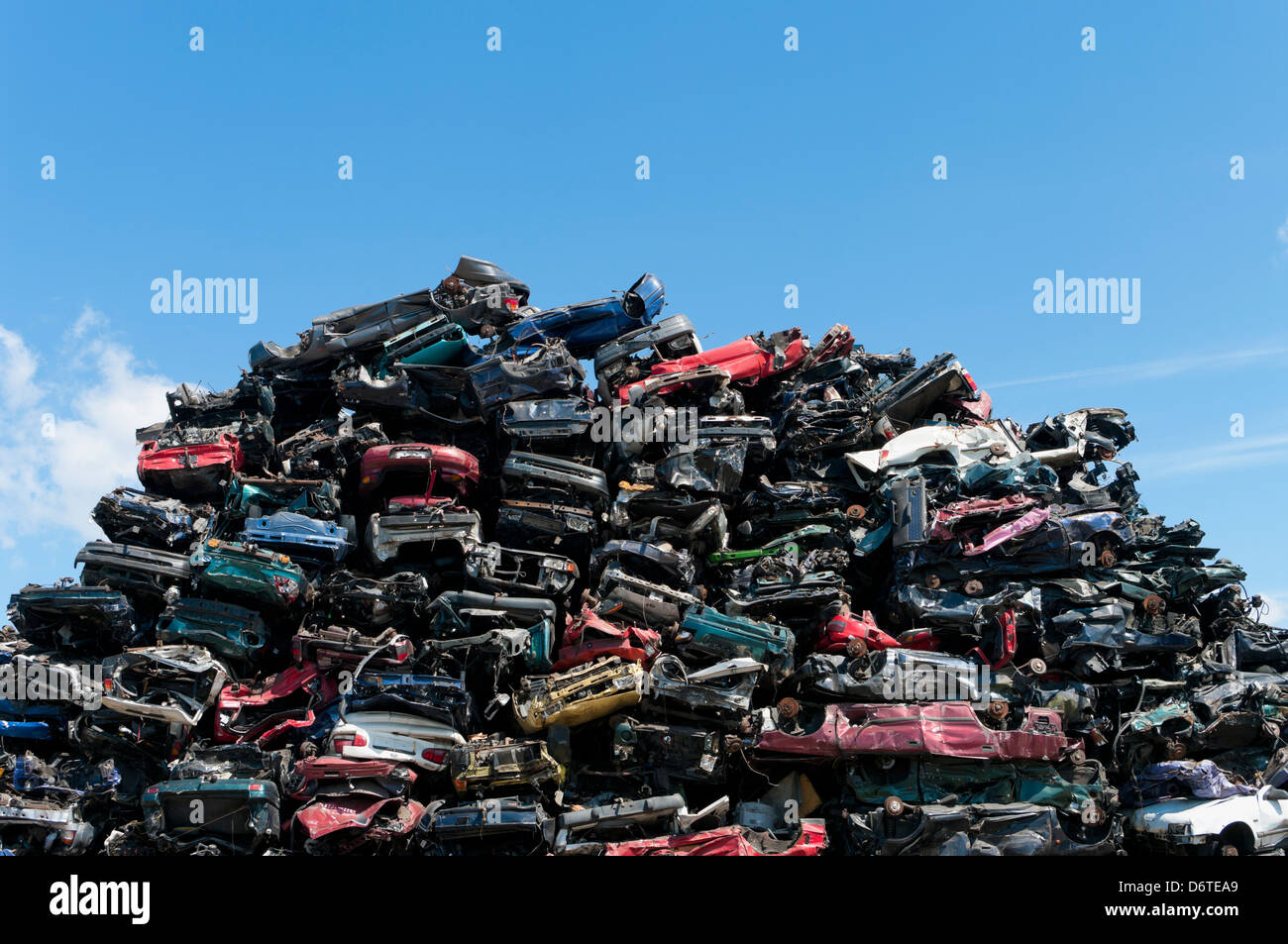 piled up compressed cars going to be shredded Stock Photo - Alamy