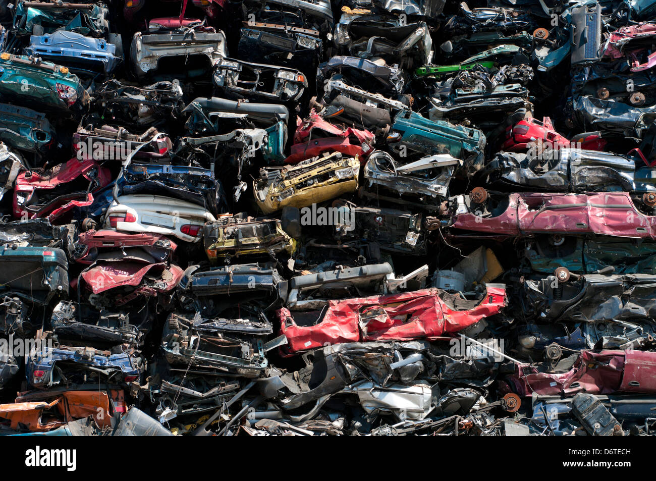 piled up compressed cars going to be shredded Stock Photo - Alamy