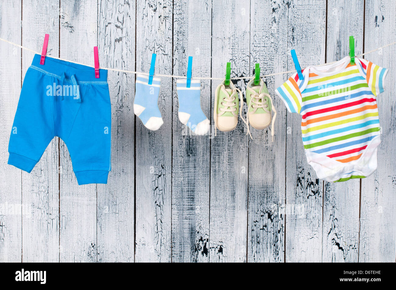 Baby clothes washing line hi-res stock photography and images - Alamy