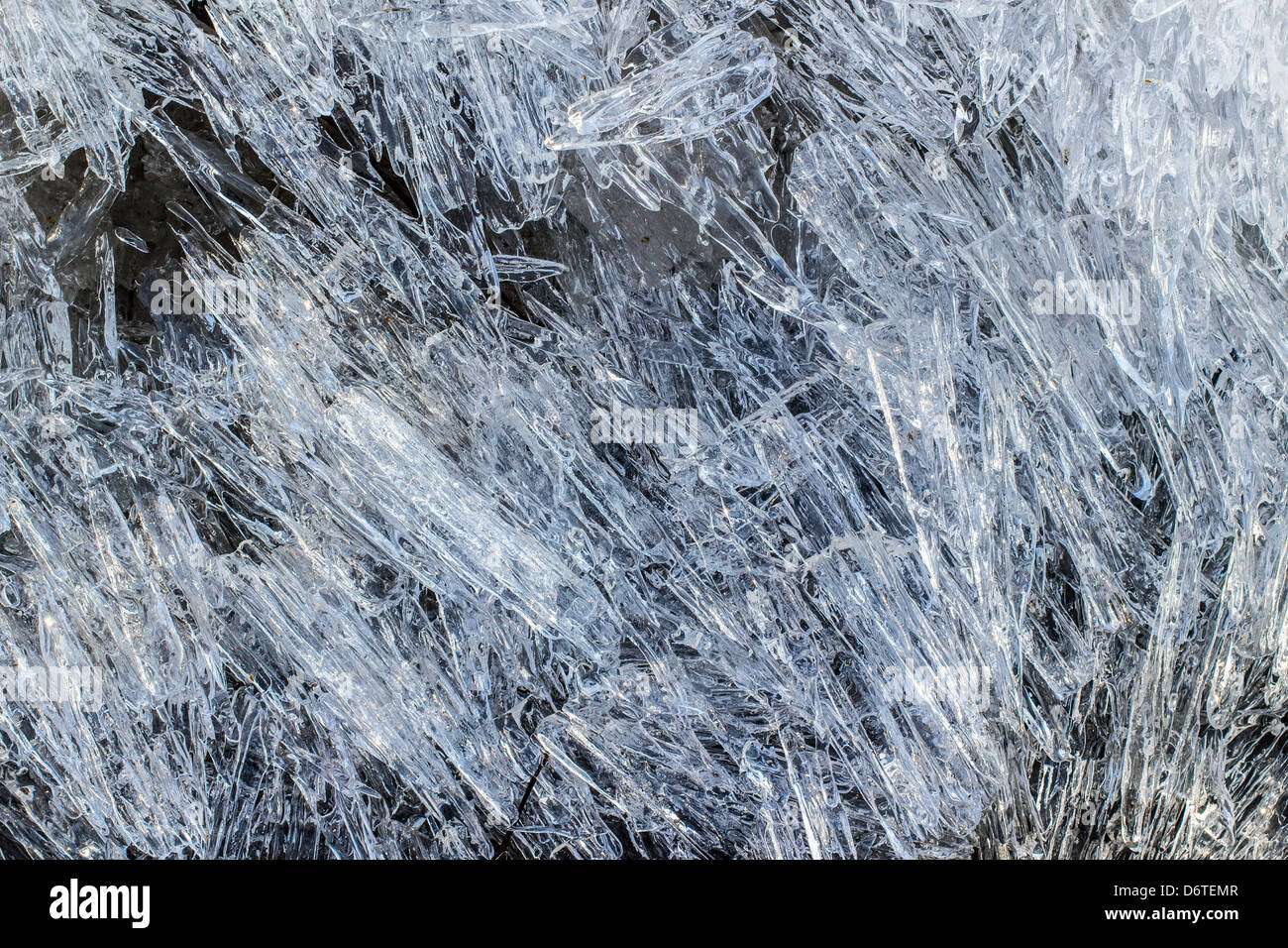 Abstract shapes of ice crystals. Needle-like crystals of ice in the ...