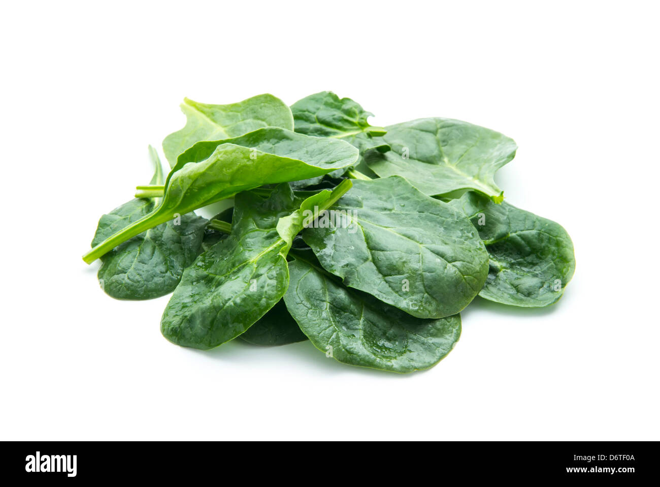 fresh spinach leaves isolated on white background Stock Photo - Alamy