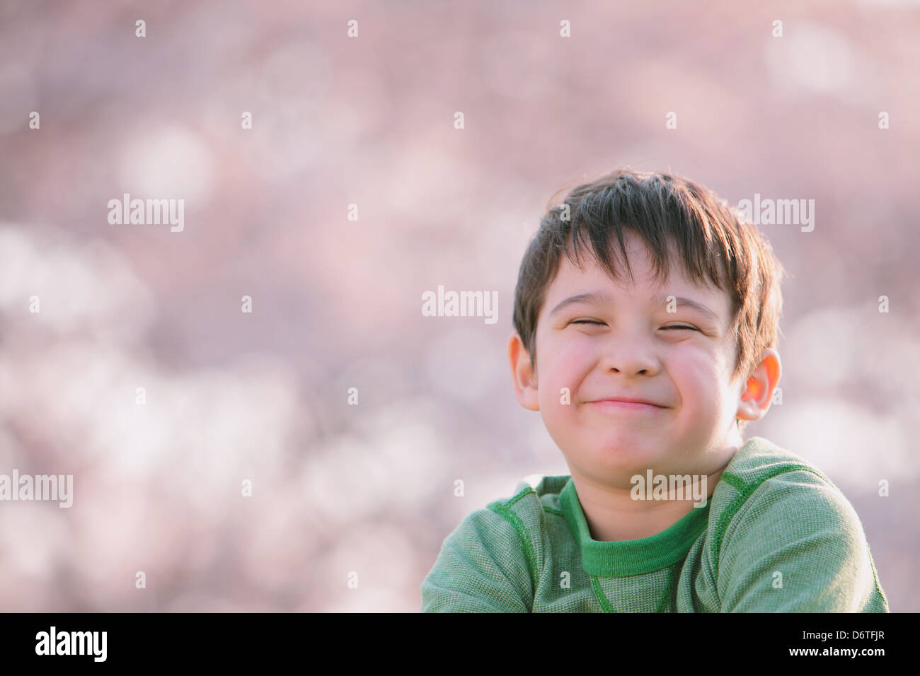 Young boy smiling at camera Stock Photo - Alamy
