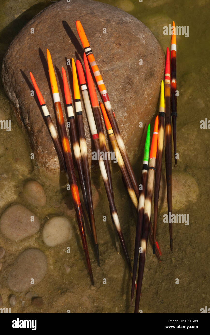 A selection of vintage porcupine quill floats Stock Photo - Alamy