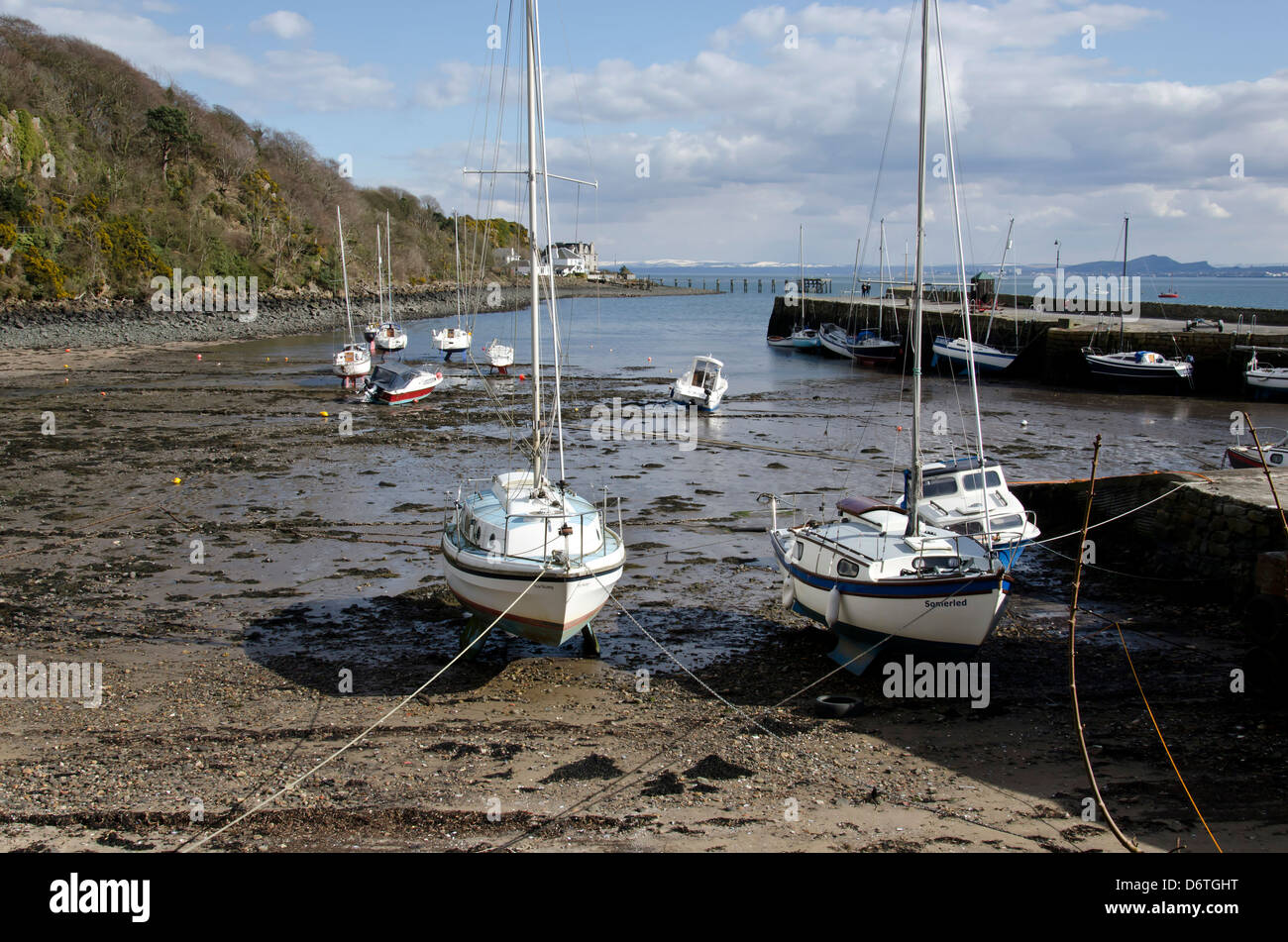 Aberdour Harbour in Fife, Scotland, with the extinct volcano "Arthur's ...