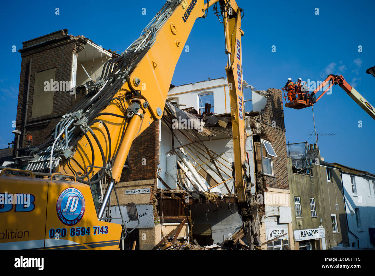 Building demolition in progress Stock Photo - Alamy
