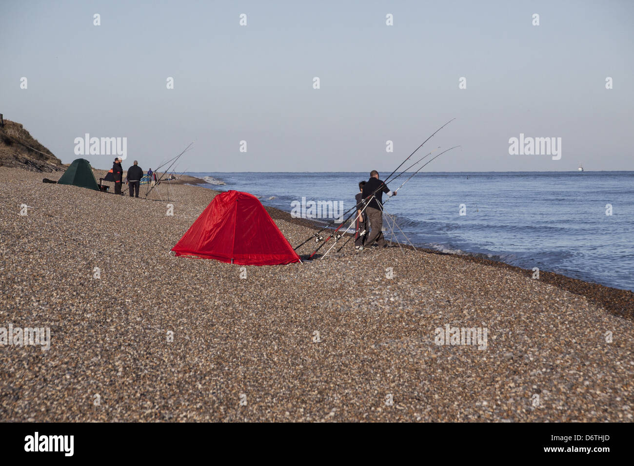 Sea fishing from the shingle beach at Thorpeness Suffolk Stock Photo ...