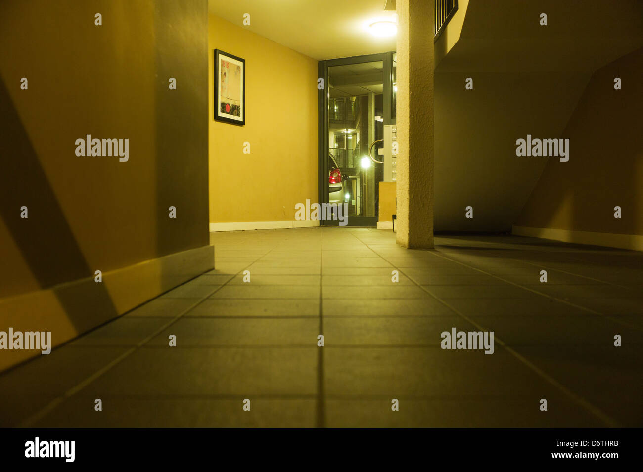 Empty tiled hallway, modern building, Brighton, UK Stock Photo - Alamy