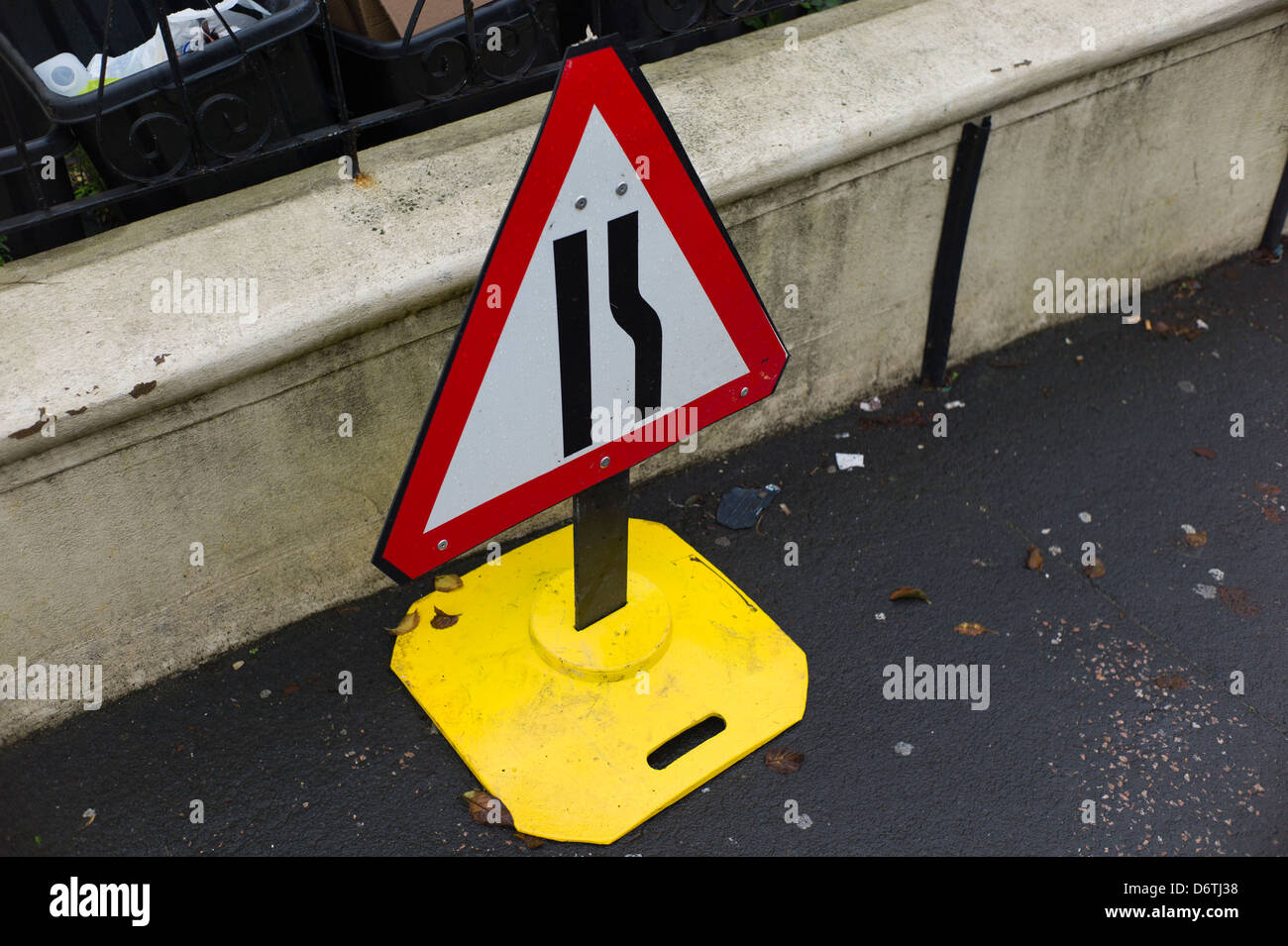 small warning sign, road narrows Stock Photo - Alamy