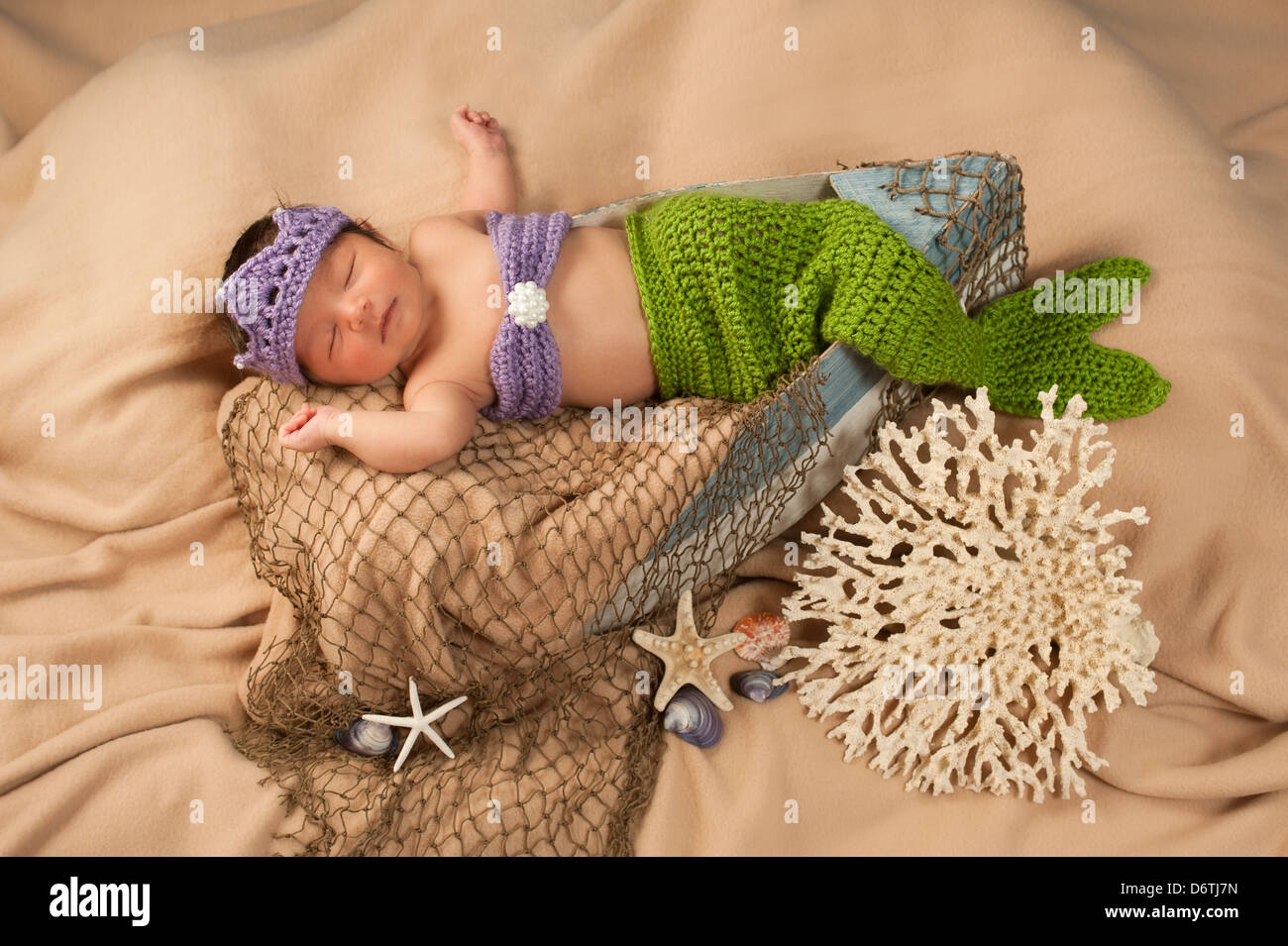 Newborn Baby in a Mermaid Costume Stock Photo - Alamy